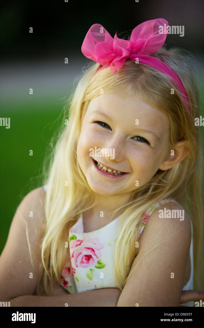Pretty little girl smiling, portrait Stock Photo - Alamy