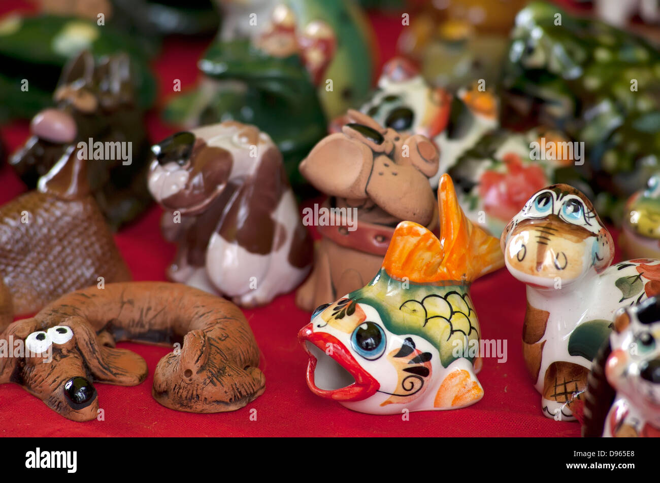 Ceramic handicrafts on table. Trading souvenirs Stock Photo - Alamy