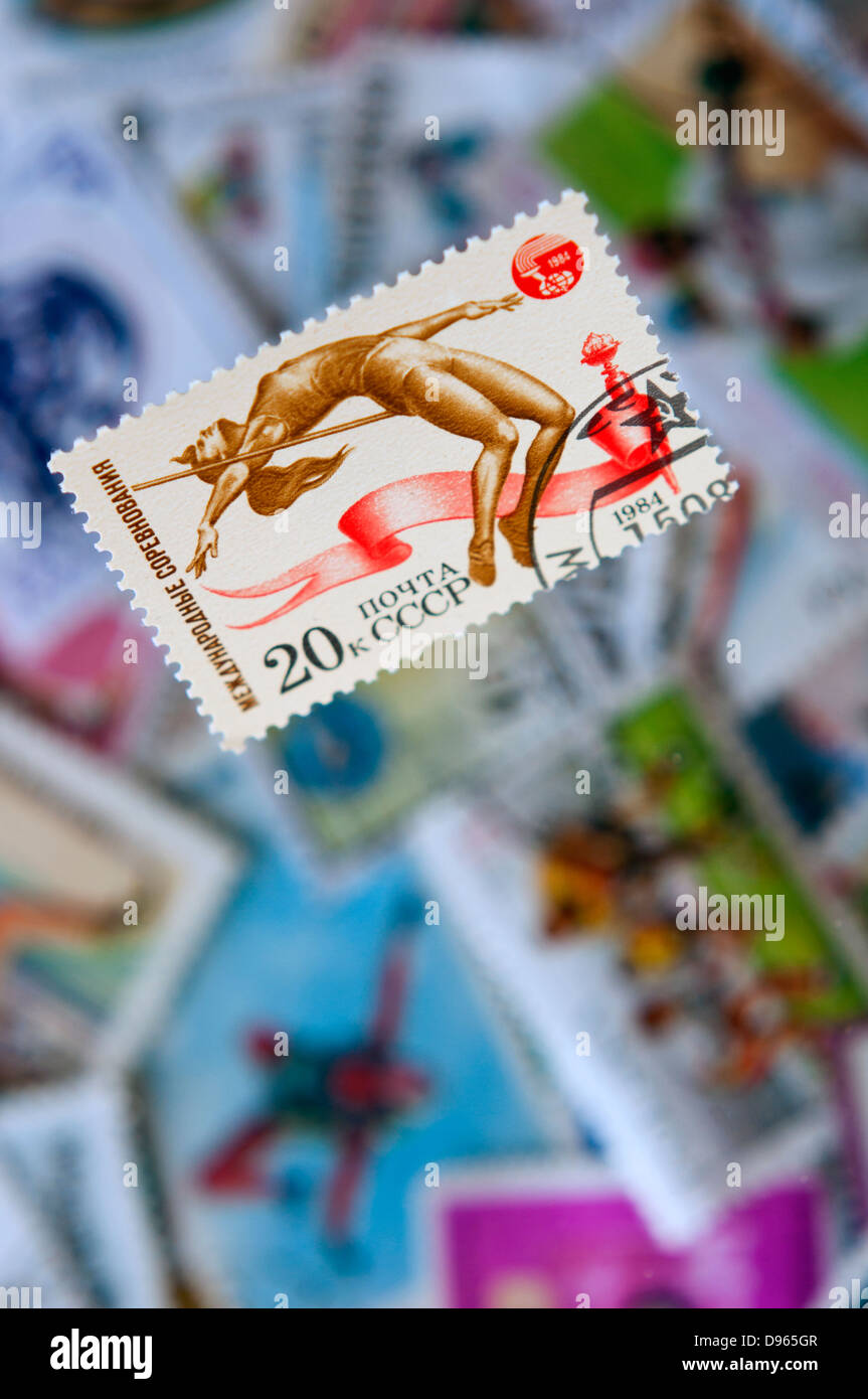 mixed sport postage stamps in studio setting Stock Photo - Alamy