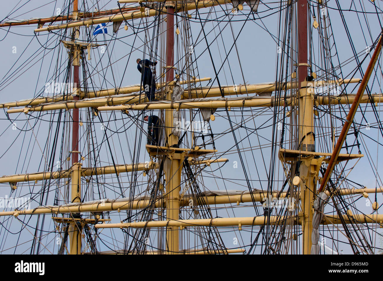 Sailors in the rigging of the veteran Norwegian tall ship Georg Stage ...
