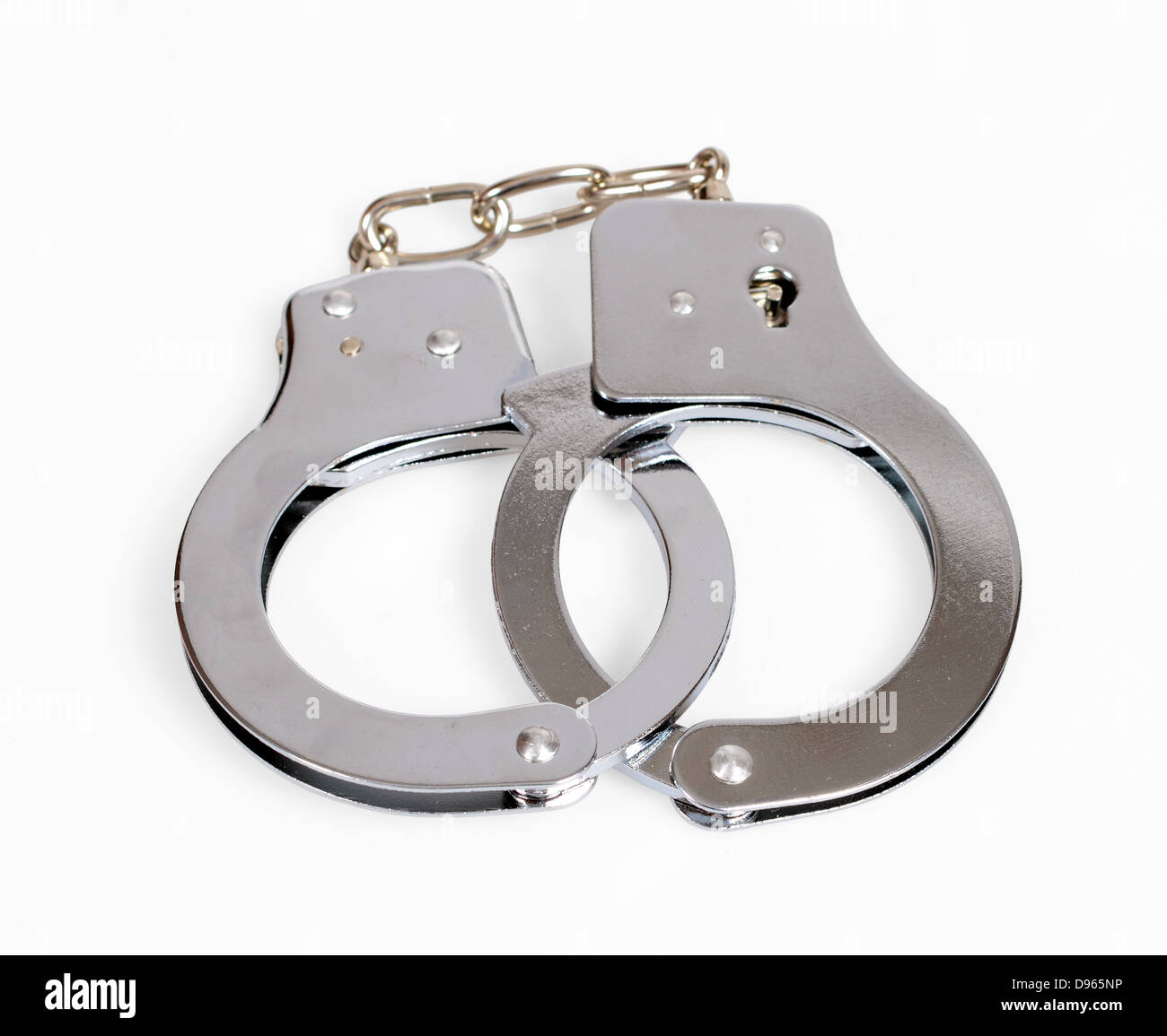 Pair of handcuffs Stock Photo - Alamy