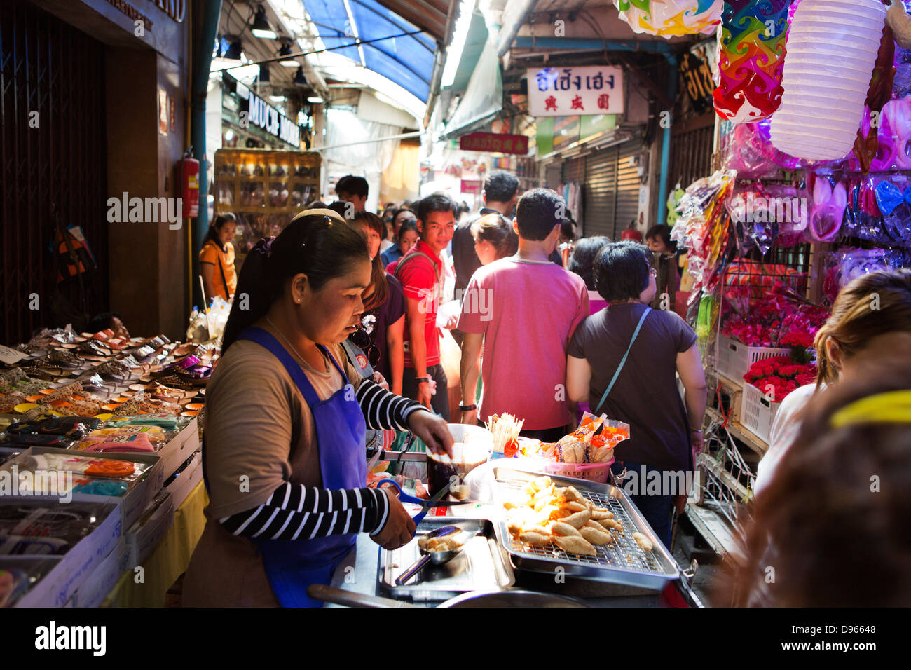 The Sampeng market, Chinatown, Bangkok, Thailand is jam packed with ...