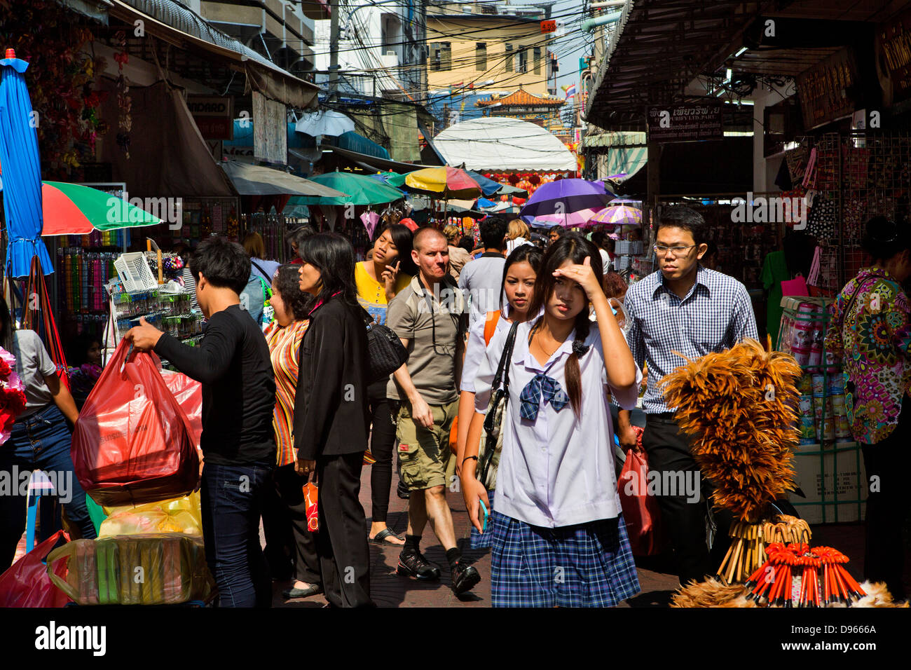 The Sampeng market, Chinatown, Bangkok, Thailand is jam packed with ...