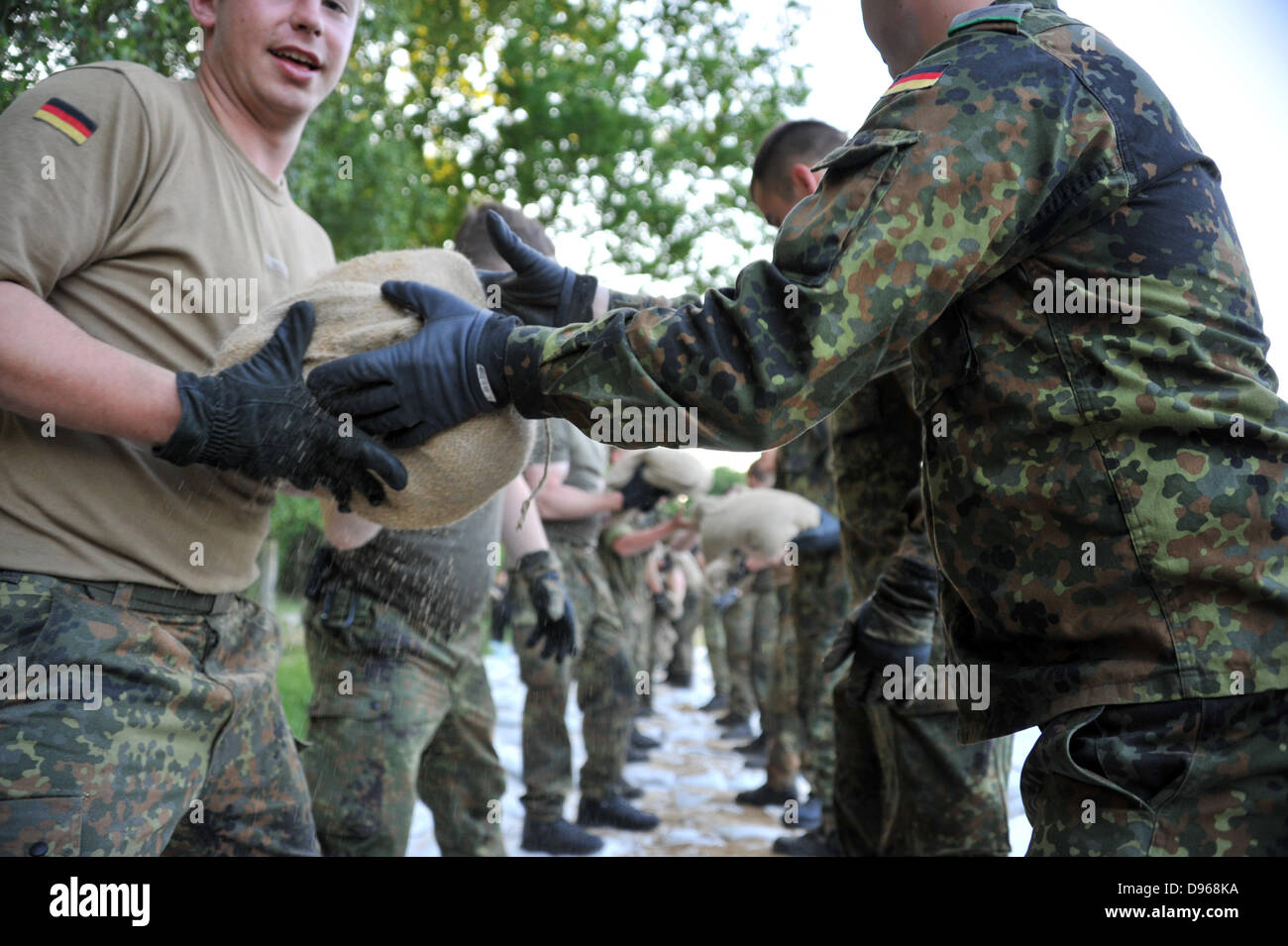 From the perspective of the paratroopers the passing of sandbags is ...