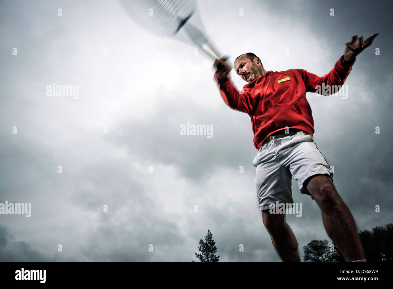 Man playing Tennis Stock Photo - Alamy