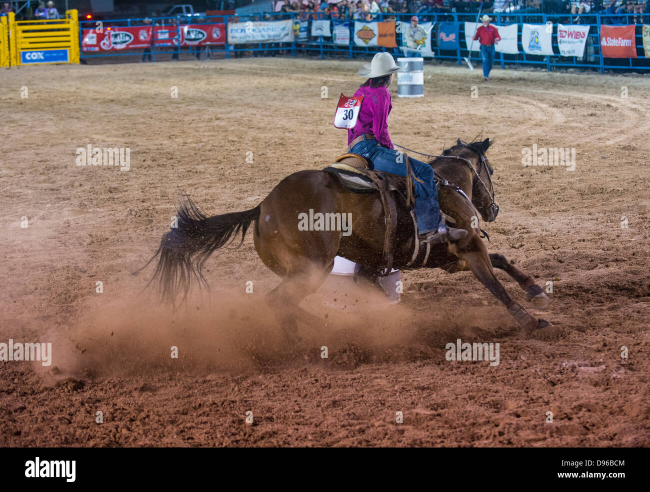 Cowgirl Participant in a Barrel racing competition at the Helldorado ...