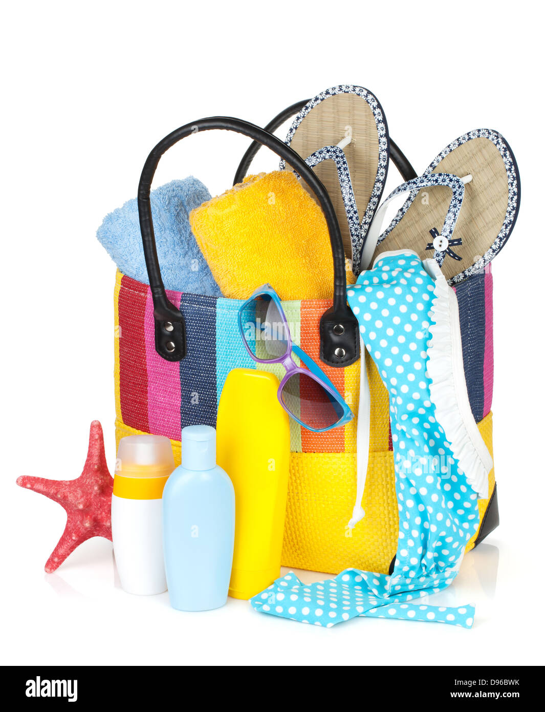 Bag with towels, sunglasses, flip-flops and beach items. Isolated on ...