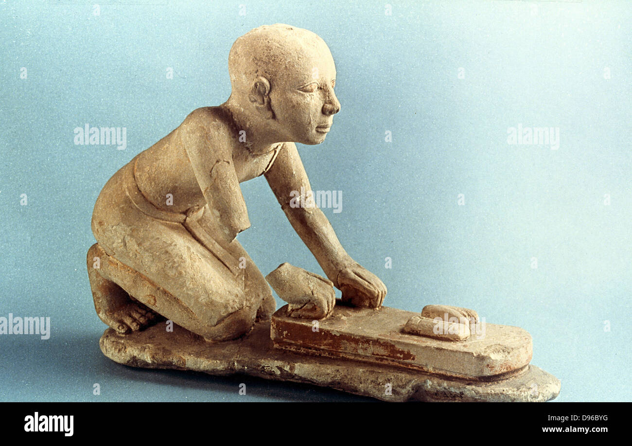 Model of a baker kneading dough and forming loaves. Ancient Egyptian ...