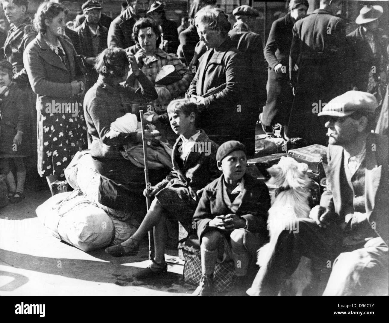World War II: Paris, July 1940: Belgian refugee families waiting at the ...