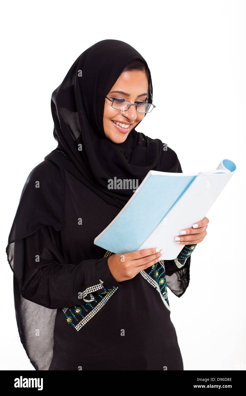 Muslim woman reading book Stock Photo - Alamy