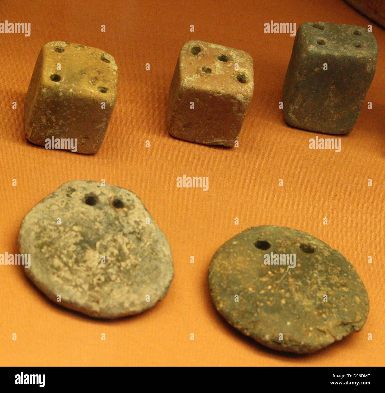 Six loon-weights, three disc-shaped and three cubes. Minoan 2100-1450 ...
