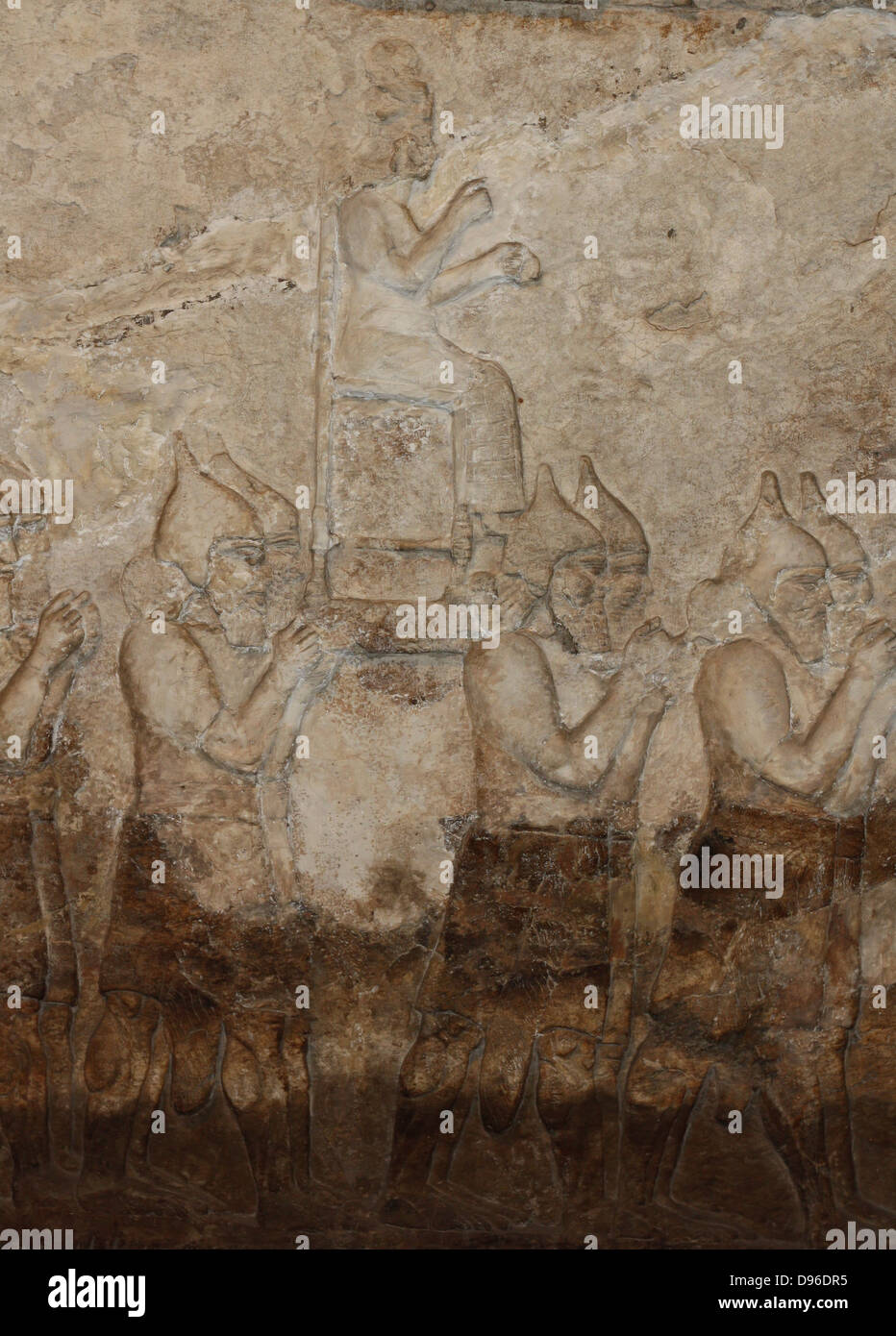 Assyrian wall-panel depicting an attack on an enemy town. Dated ...