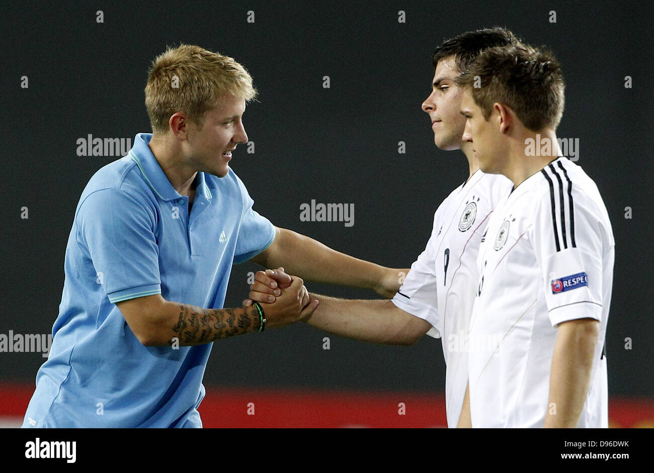 Germany's Lewis Holtby (L-R) celebrates the victory with Kevin Volland ...