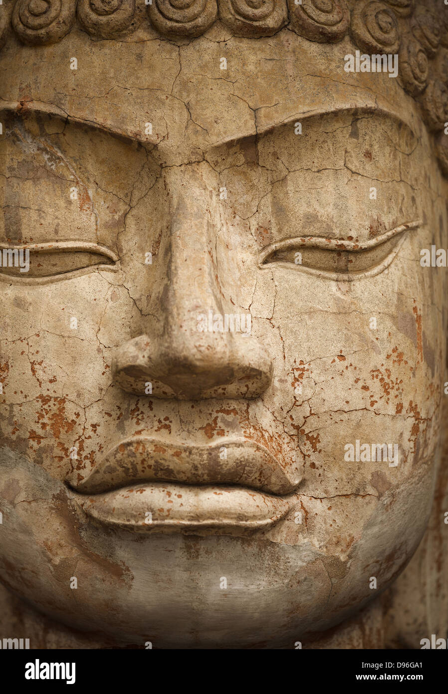 Stone statue of a Buddha. Face close up Stock Photo - Alamy