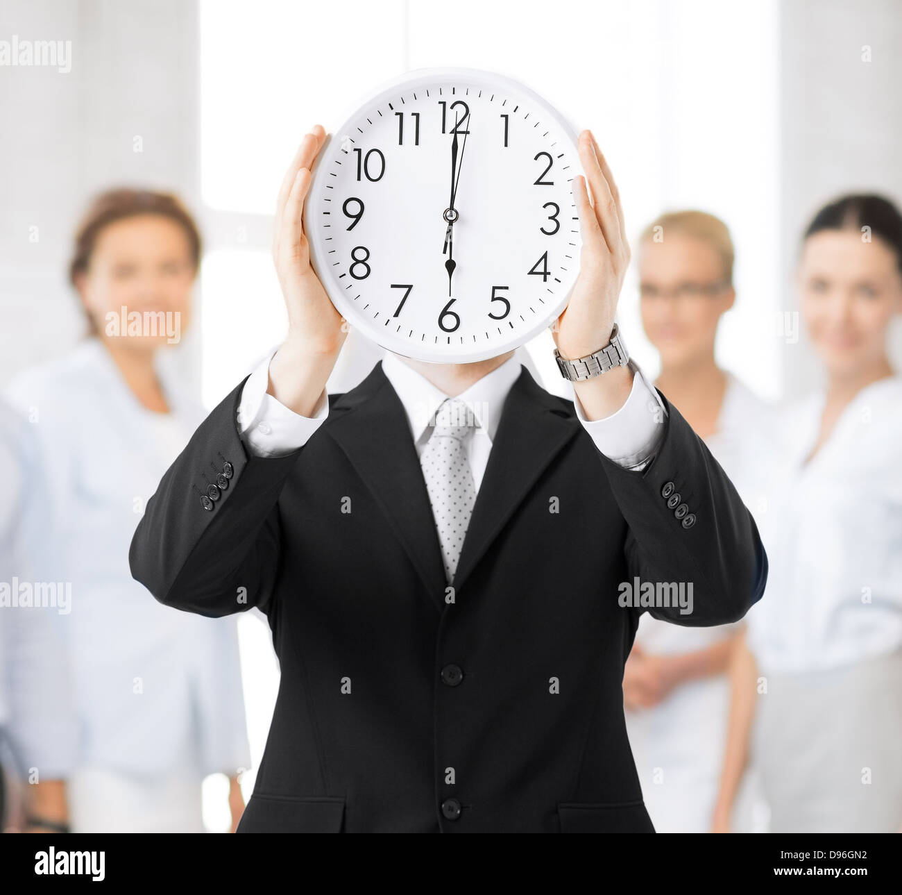 man with wall clock Stock Photo - Alamy