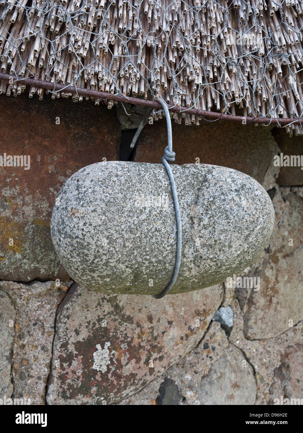 Heavy stone used to weight down thatched roofs of crofter cottages on ...