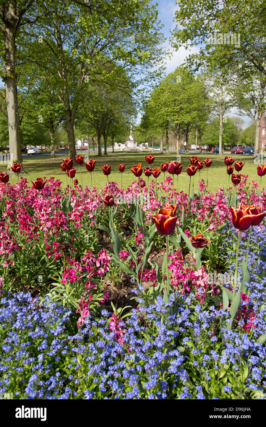Village of Port Sunlight, England. Early summer view of flowers in full ...