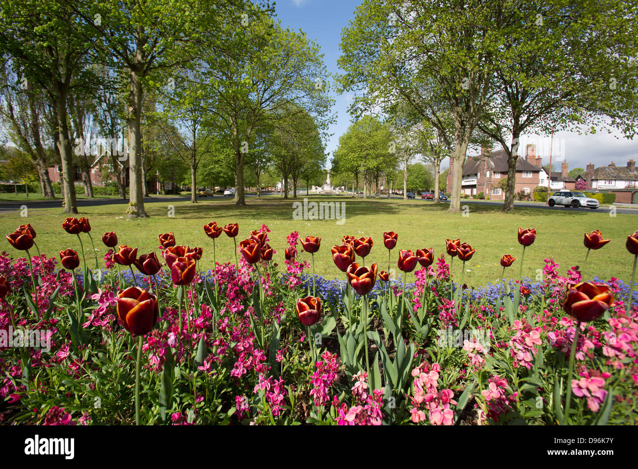 Village of Port Sunlight, England. Early summer view of flowers in full ...