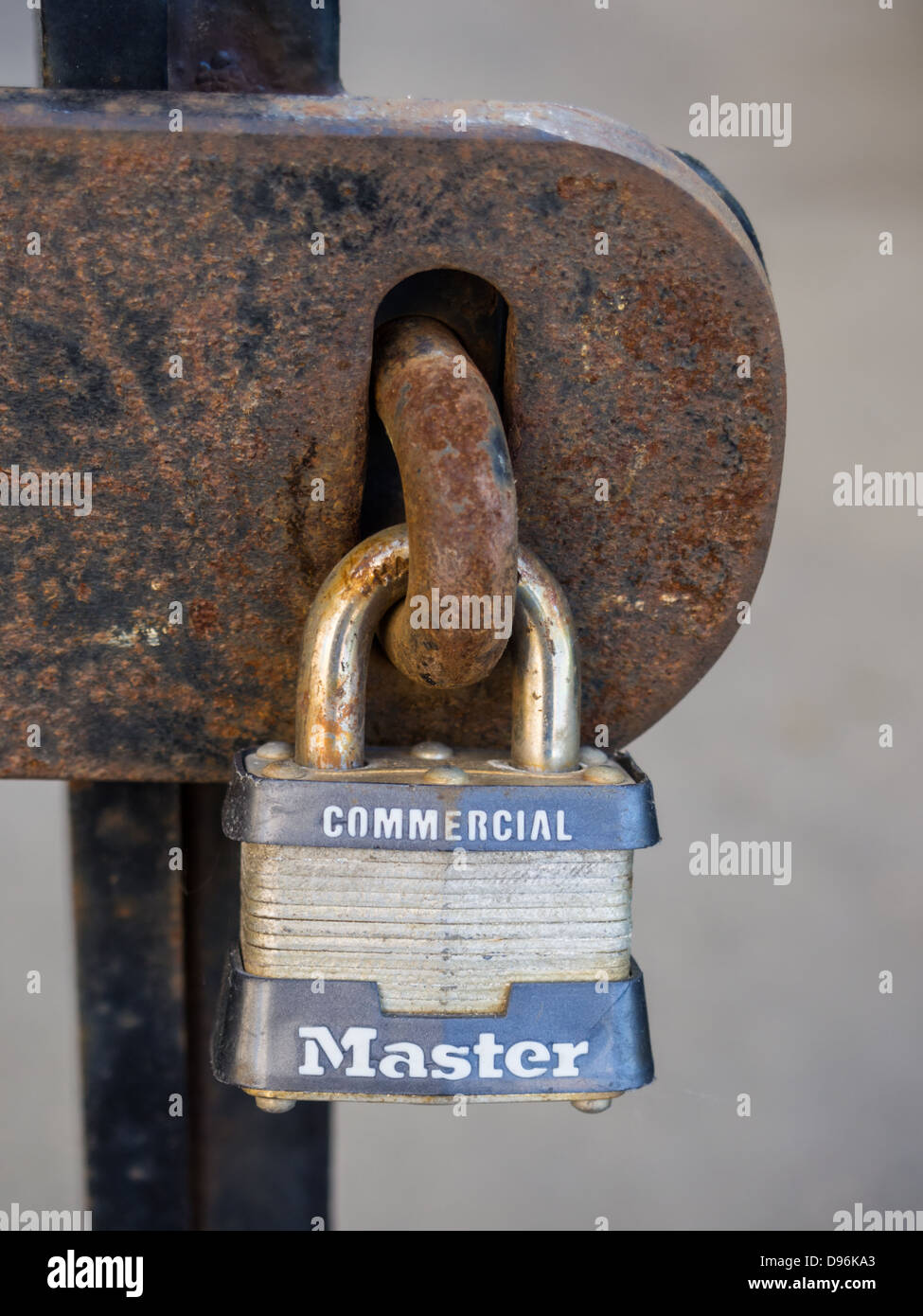 rusted Master lock on iron gate Stock Photo - Alamy