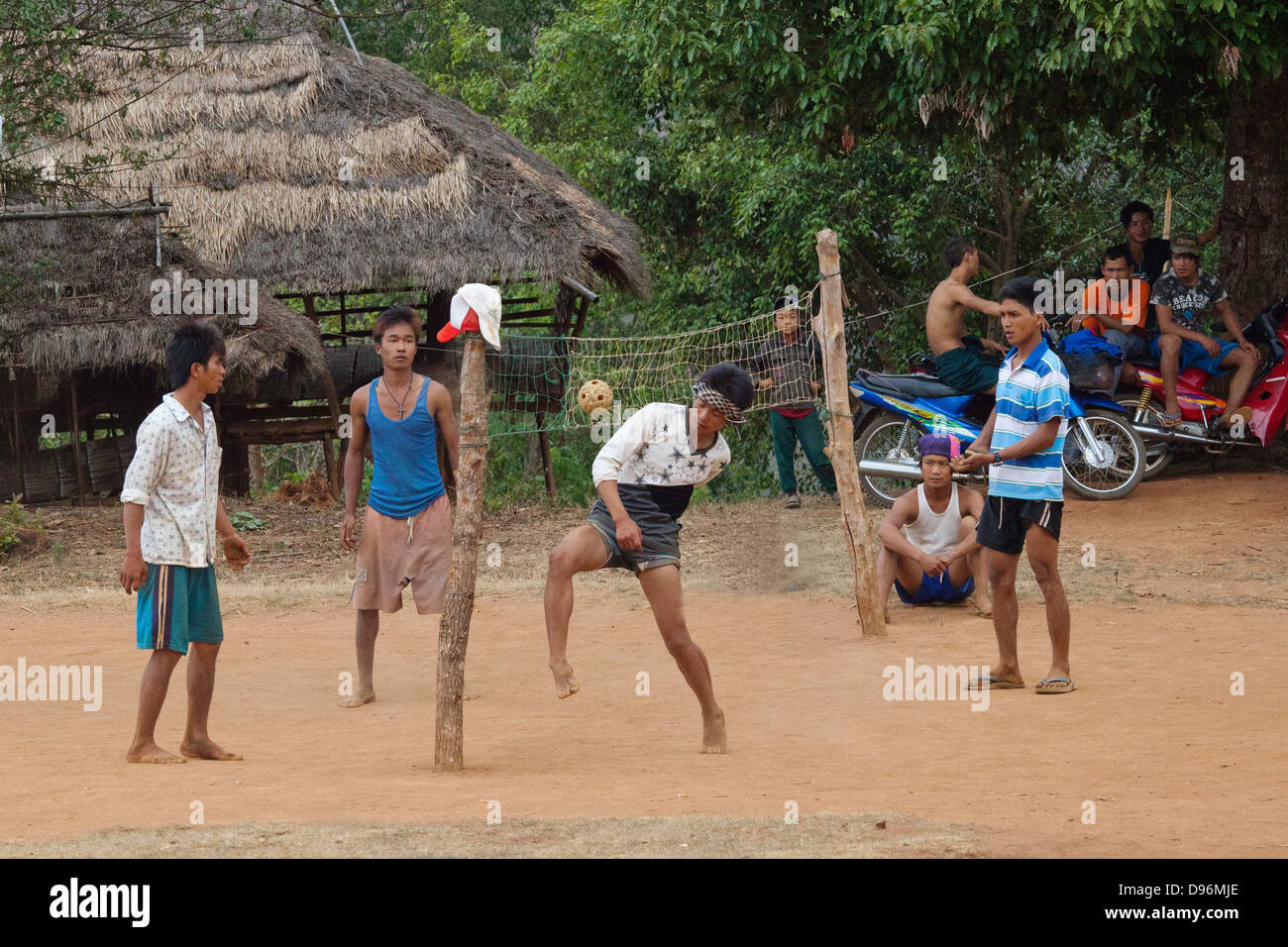 Young AKHA men play a version of volleyball using their heads - village ...