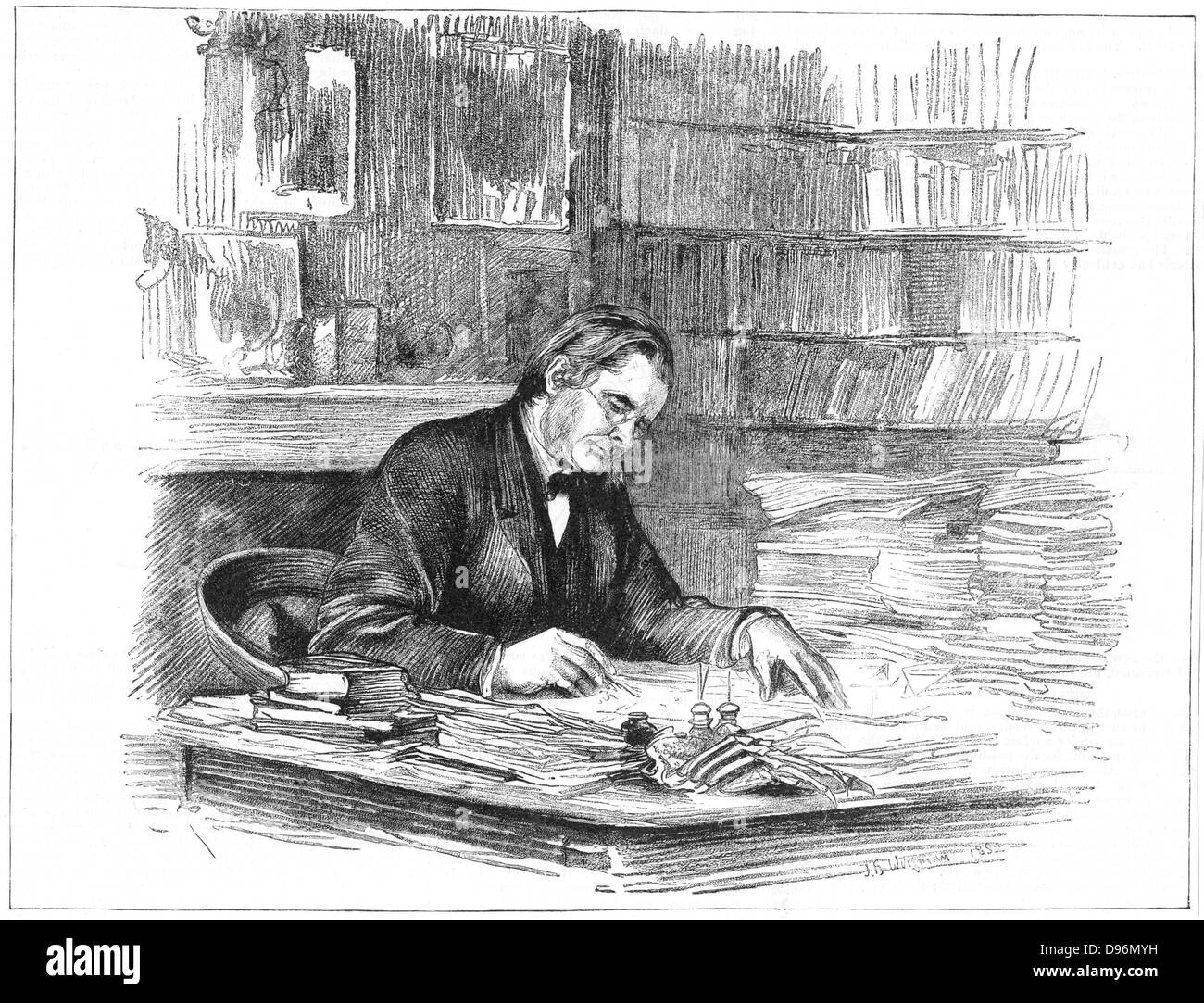 Thomas Henry Huxley (1825-1895) British biologist, at his desk in 1882 ...