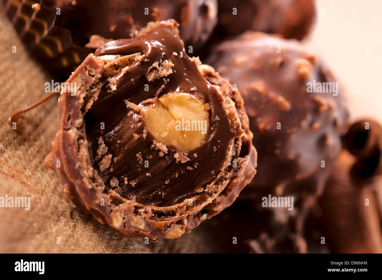 Selective focus on the nut in praline Stock Photo - Alamy