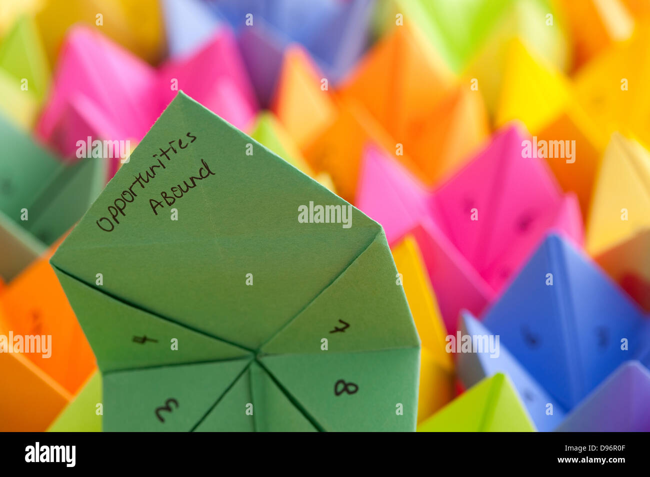 Multicolored cootie catchers, origami fortune teller with numbers and ...