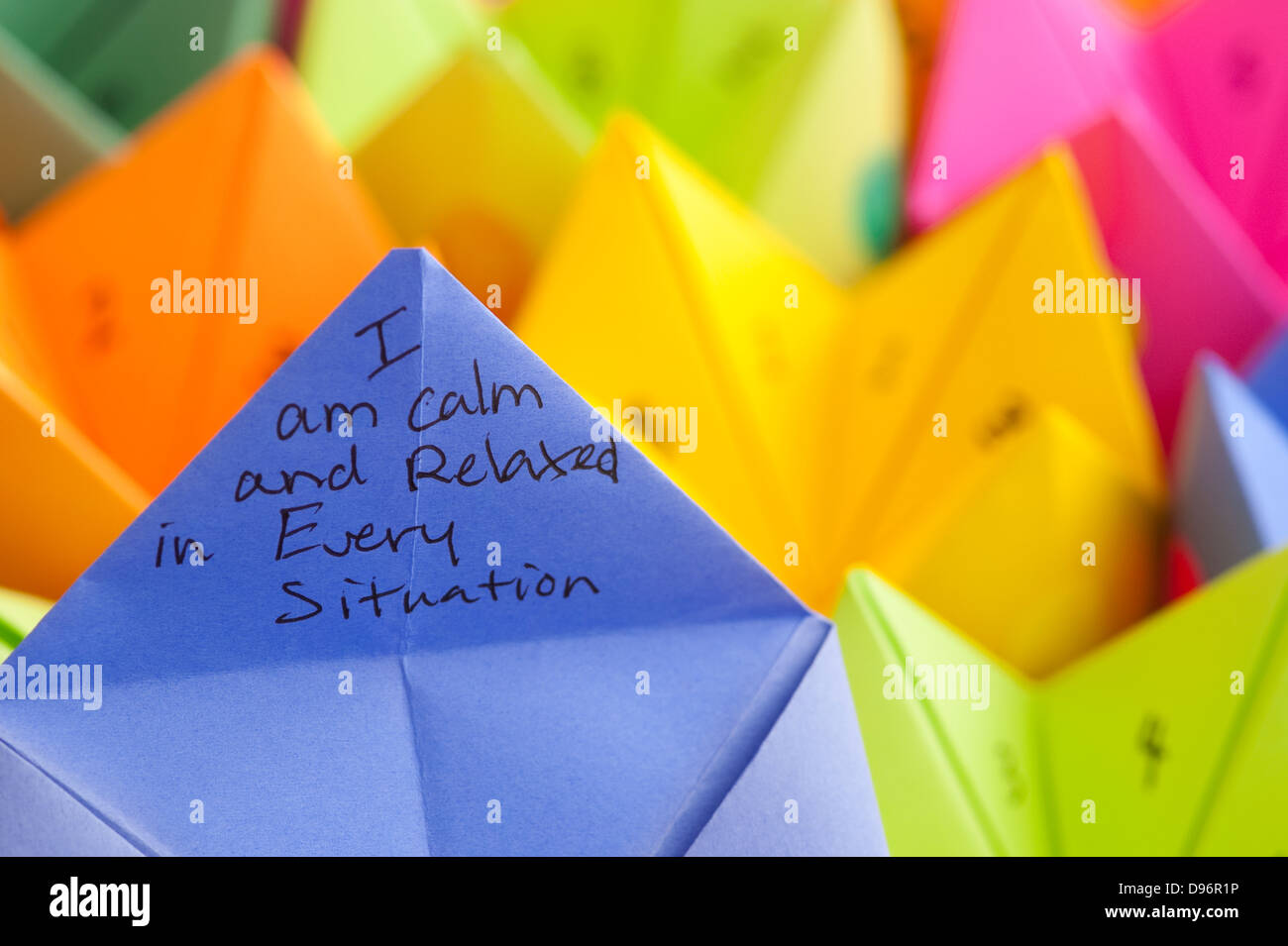 Multicolored cootie catchers, origami fortune teller with numbers and ...