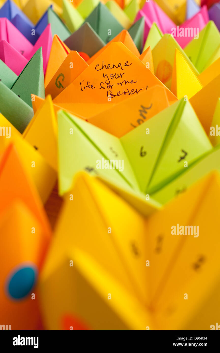 Multicolored cootie catchers, origami fortune teller with numbers and ...