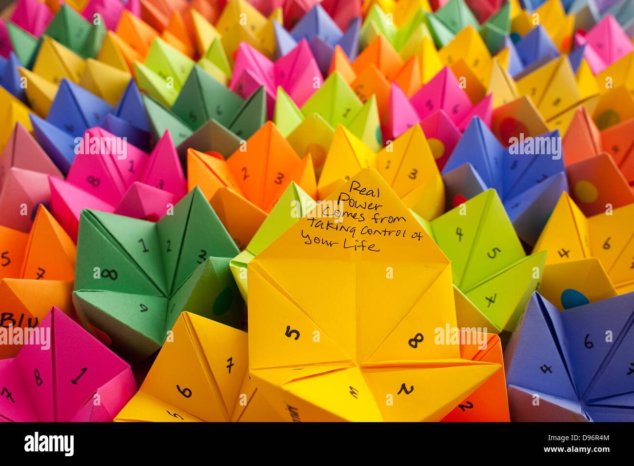 Multicolored cootie catchers, origami fortune teller with numbers and ...