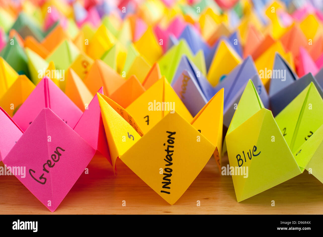 Multicolored cootie catchers, origami fortune teller with numbers and ...