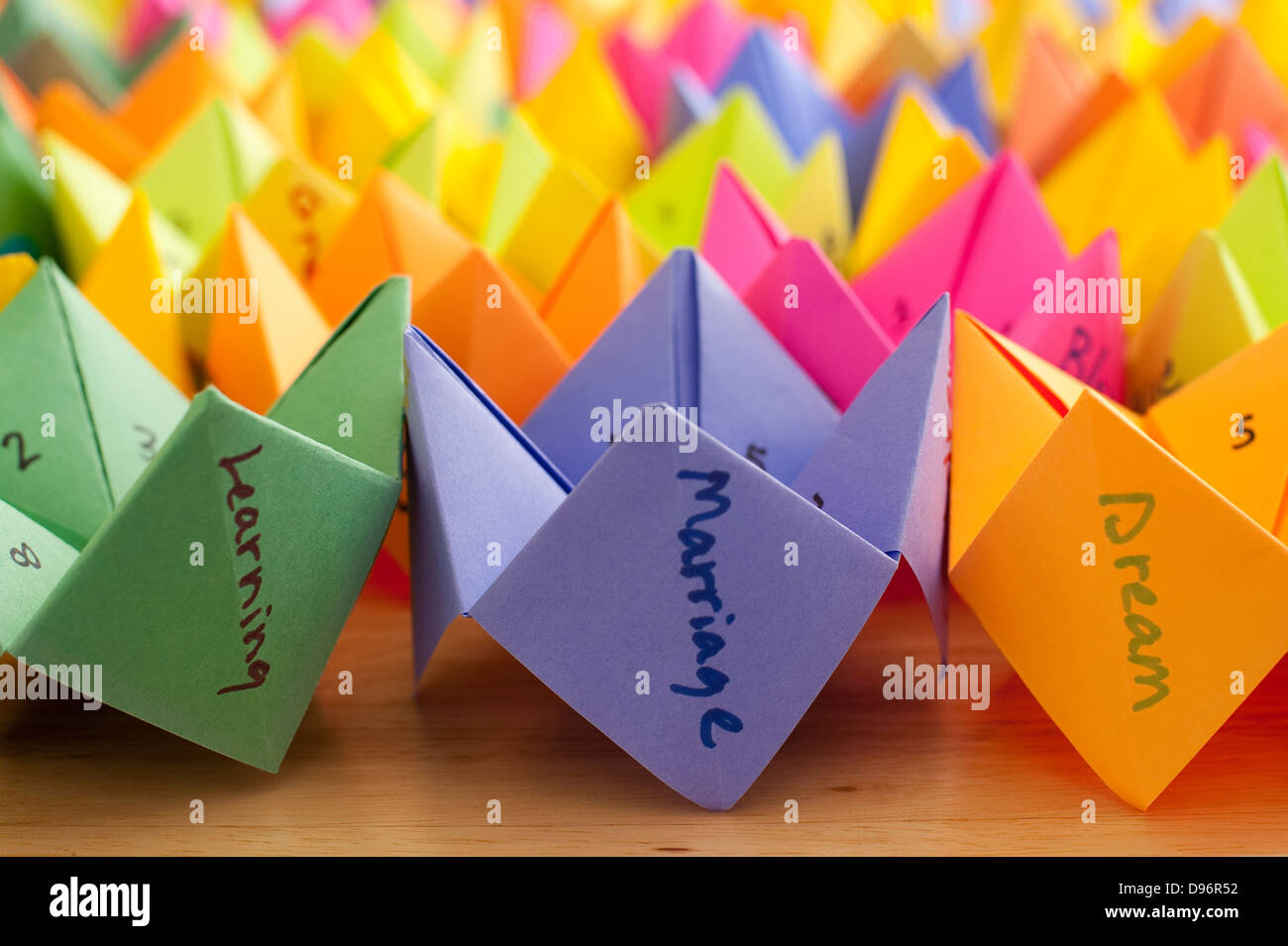 Multicolored cootie catchers, origami fortune teller with numbers and ...