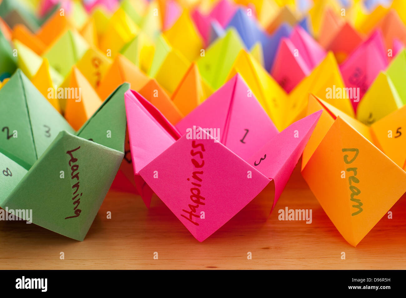 Multicolored cootie catchers, origami fortune teller with numbers and ...