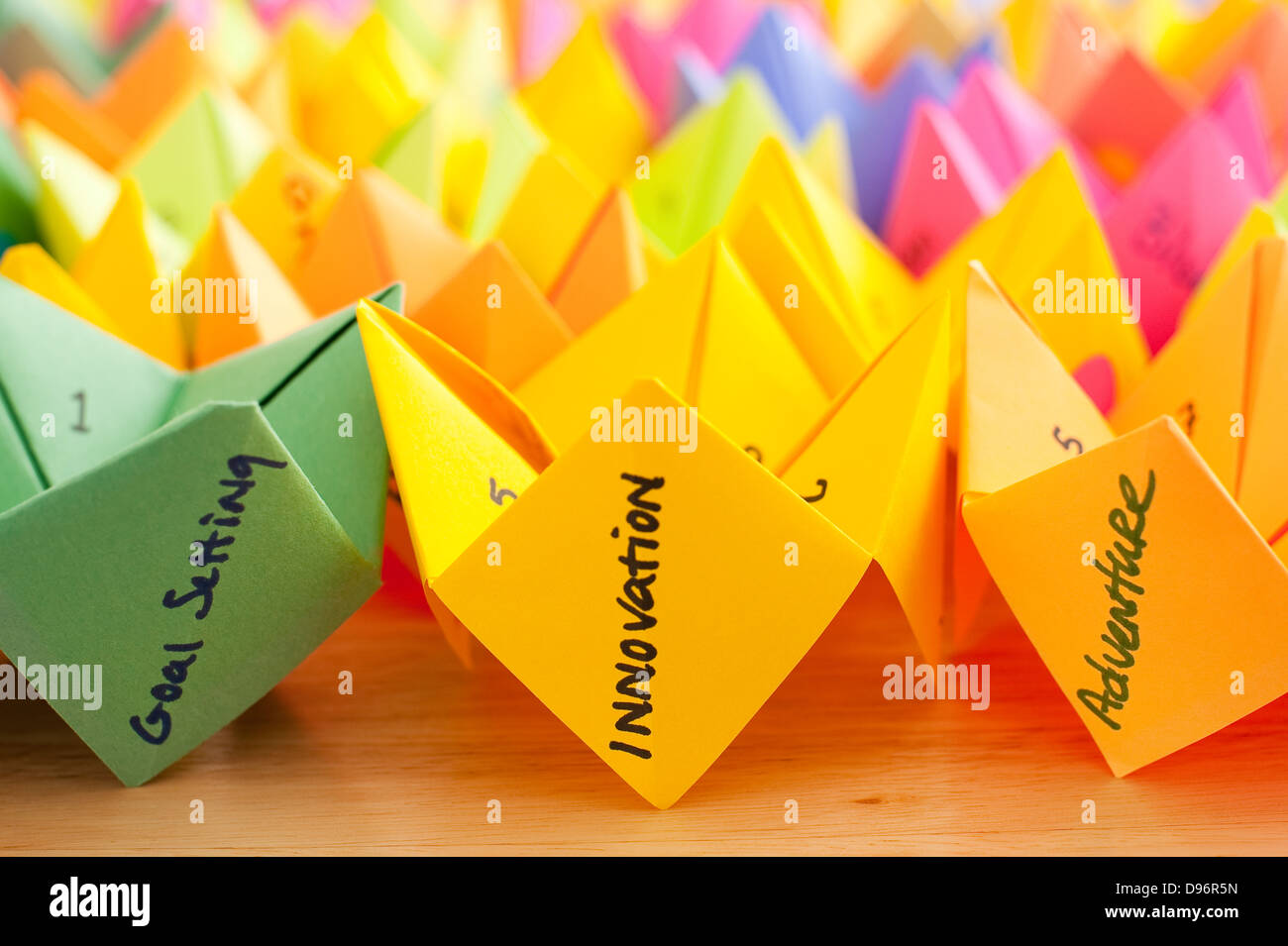 Multicolored cootie catchers, origami fortune teller with numbers and ...
