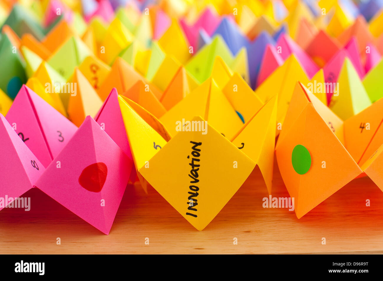 Multicolored cootie catchers, origami fortune teller with numbers and ...