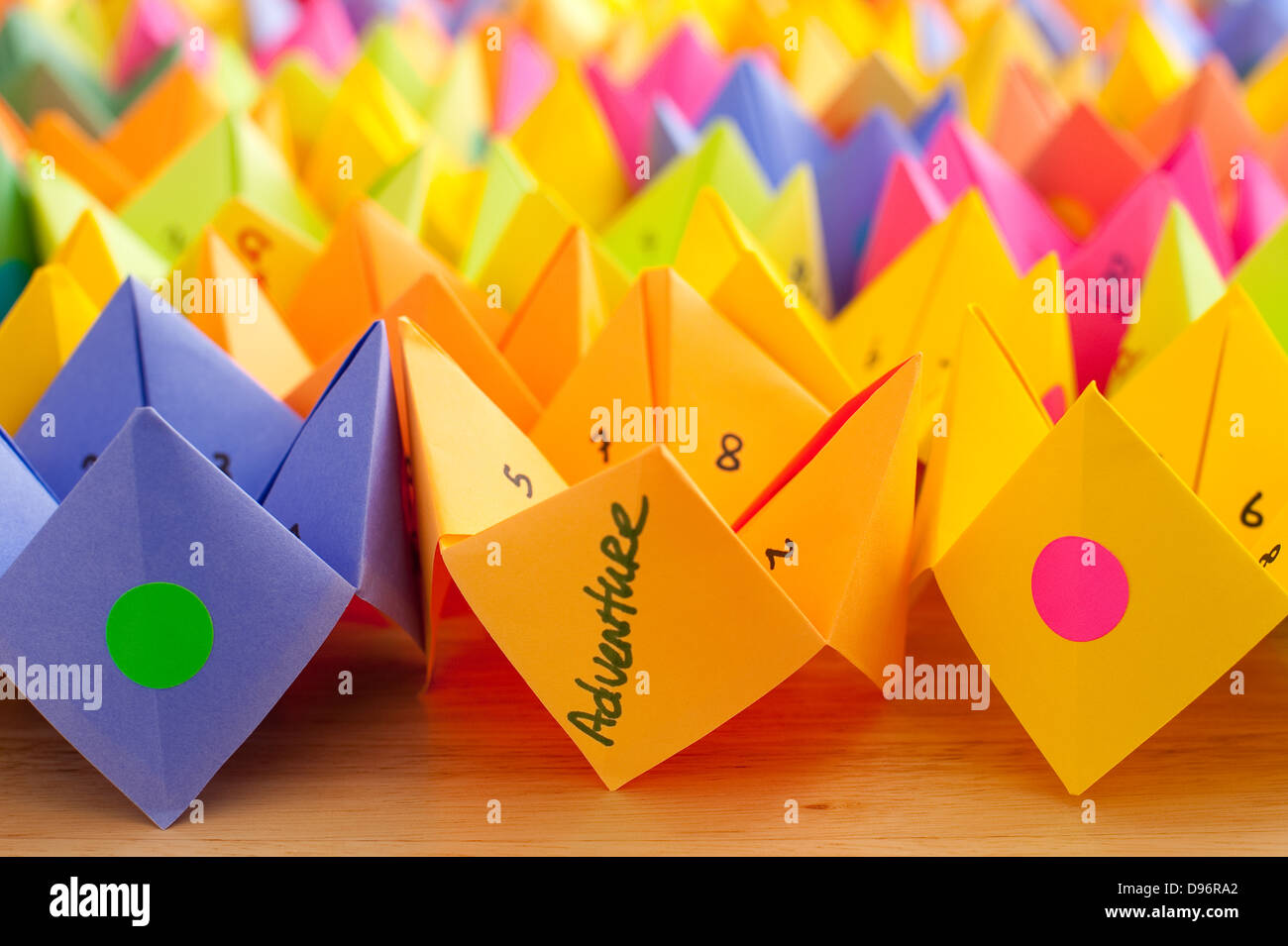Multicolored cootie catchers, origami fortune teller with numbers and ...