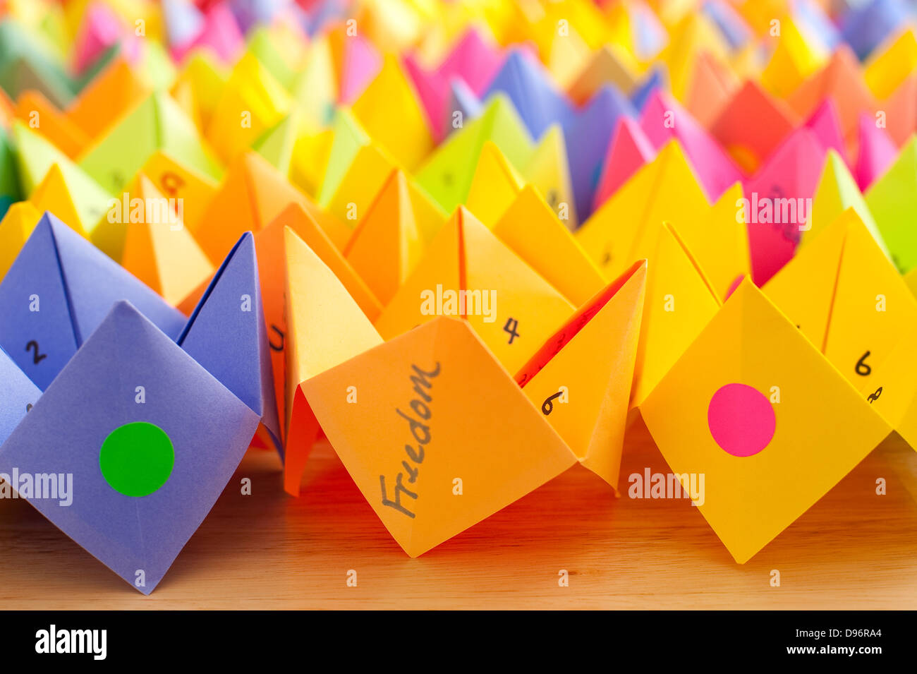 Multicolored cootie catchers, origami fortune teller with numbers and ...