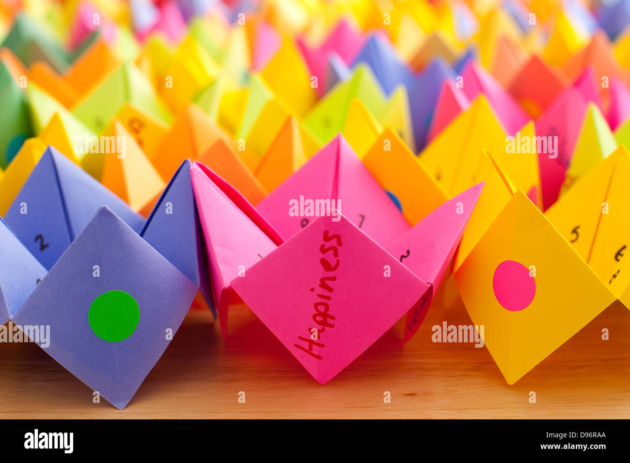 Multicolored cootie catchers, origami fortune teller with numbers and ...