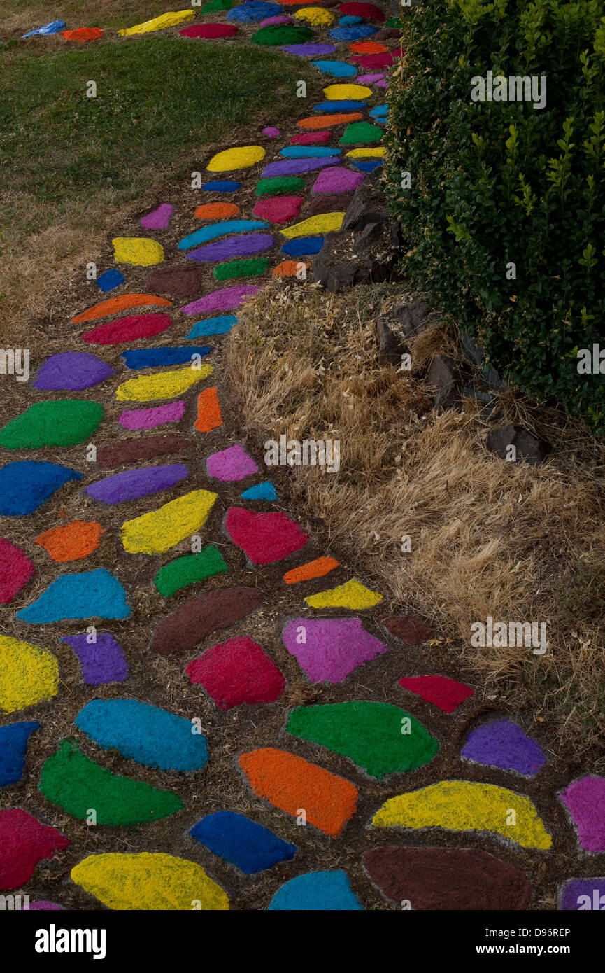 Rock path through yard with rocks multicolored Stock Photo - Alamy