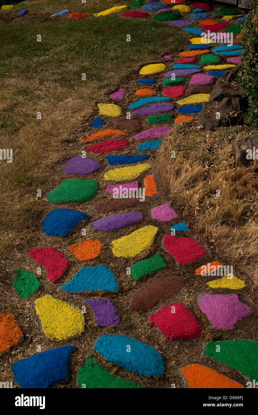 Rock path through yard with rocks multicolored Stock Photo - Alamy