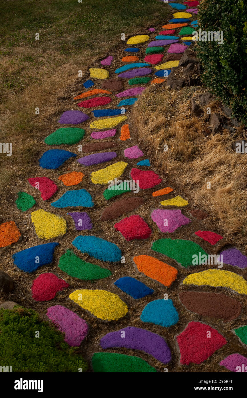 Rock path through yard with rocks multicolored Stock Photo - Alamy