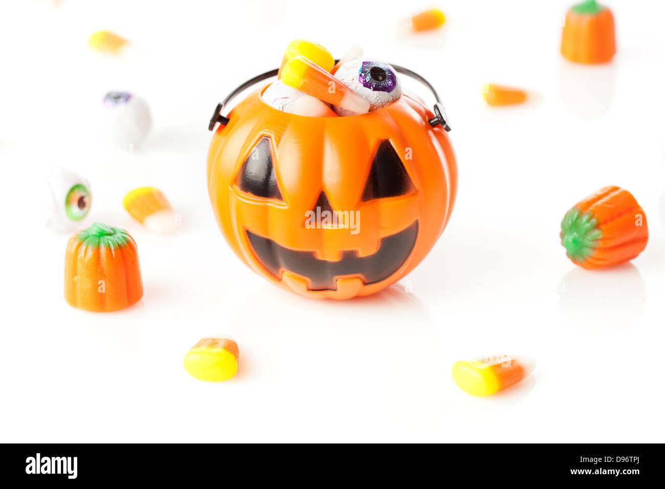 Spooky Orange Halloween Candy against a background Stock Photo - Alamy