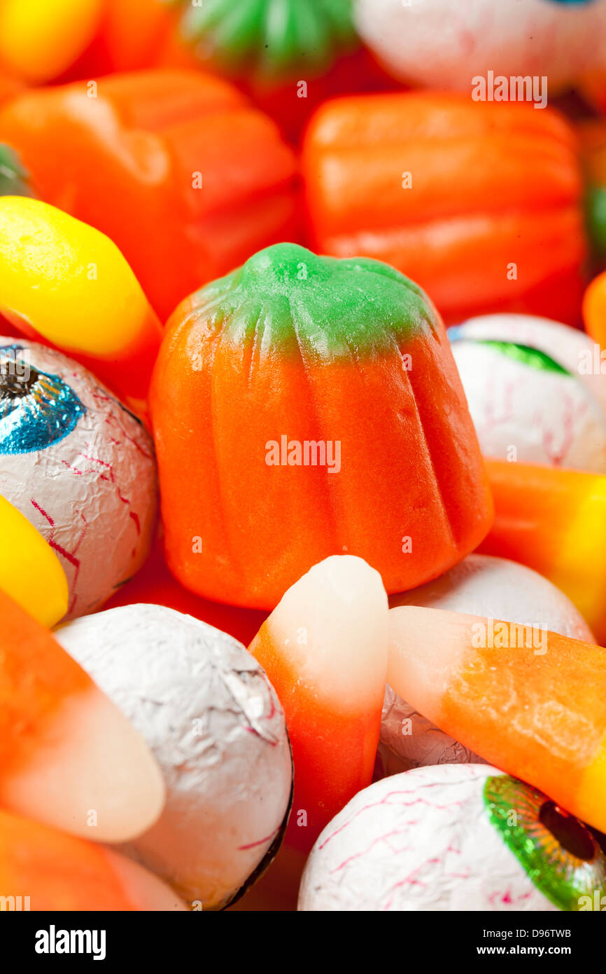 Spooky Orange Halloween Candy against a background Stock Photo - Alamy