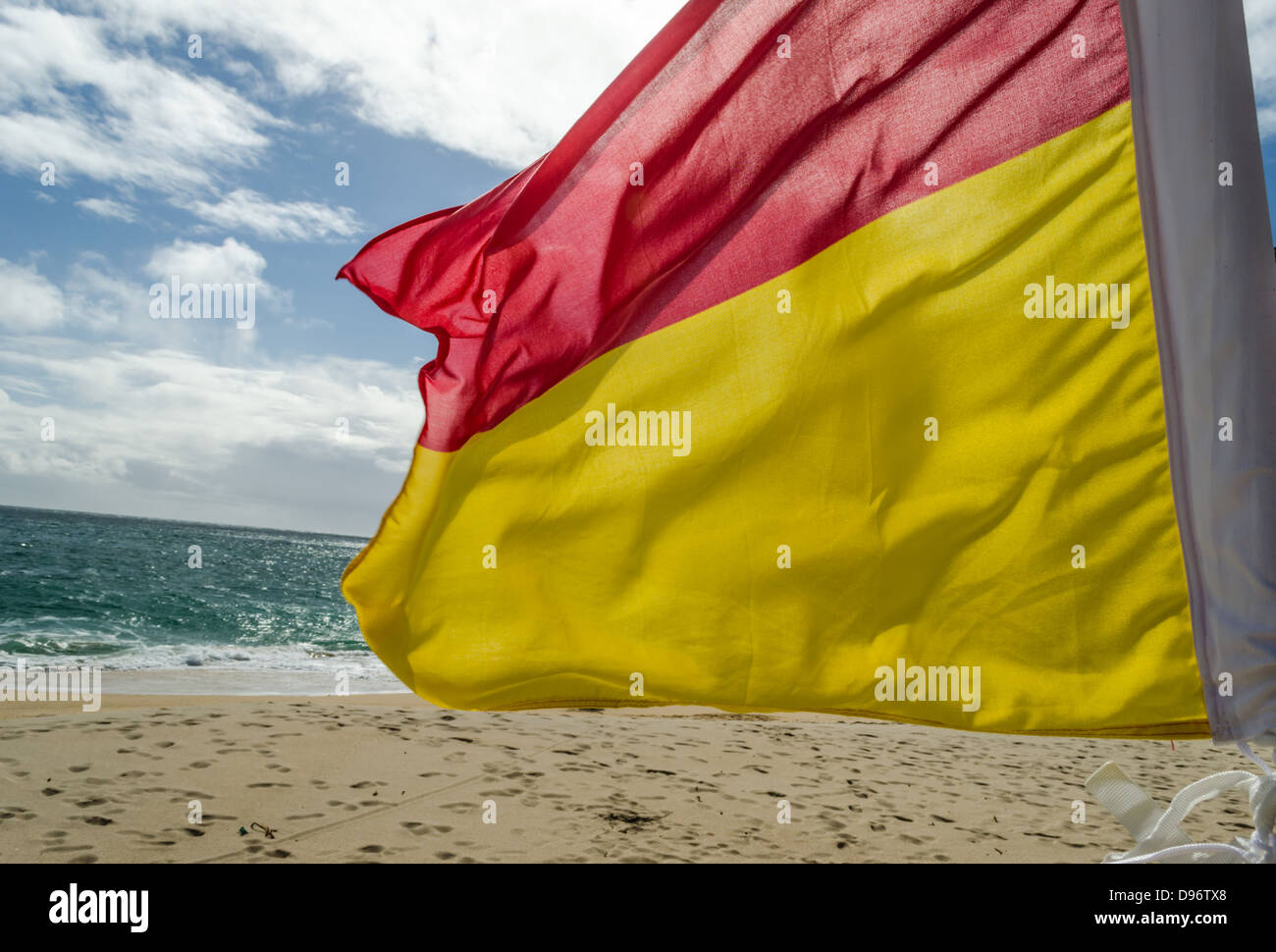 Lifeguard flag at Porthcurno Beach. Cornwall, England Stock Photo - Alamy