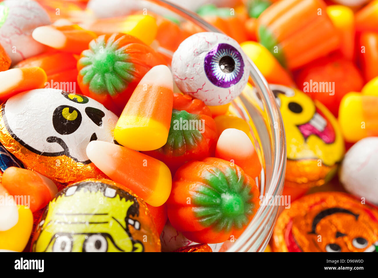 Spooky Orange Halloween Candy against a background Stock Photo - Alamy