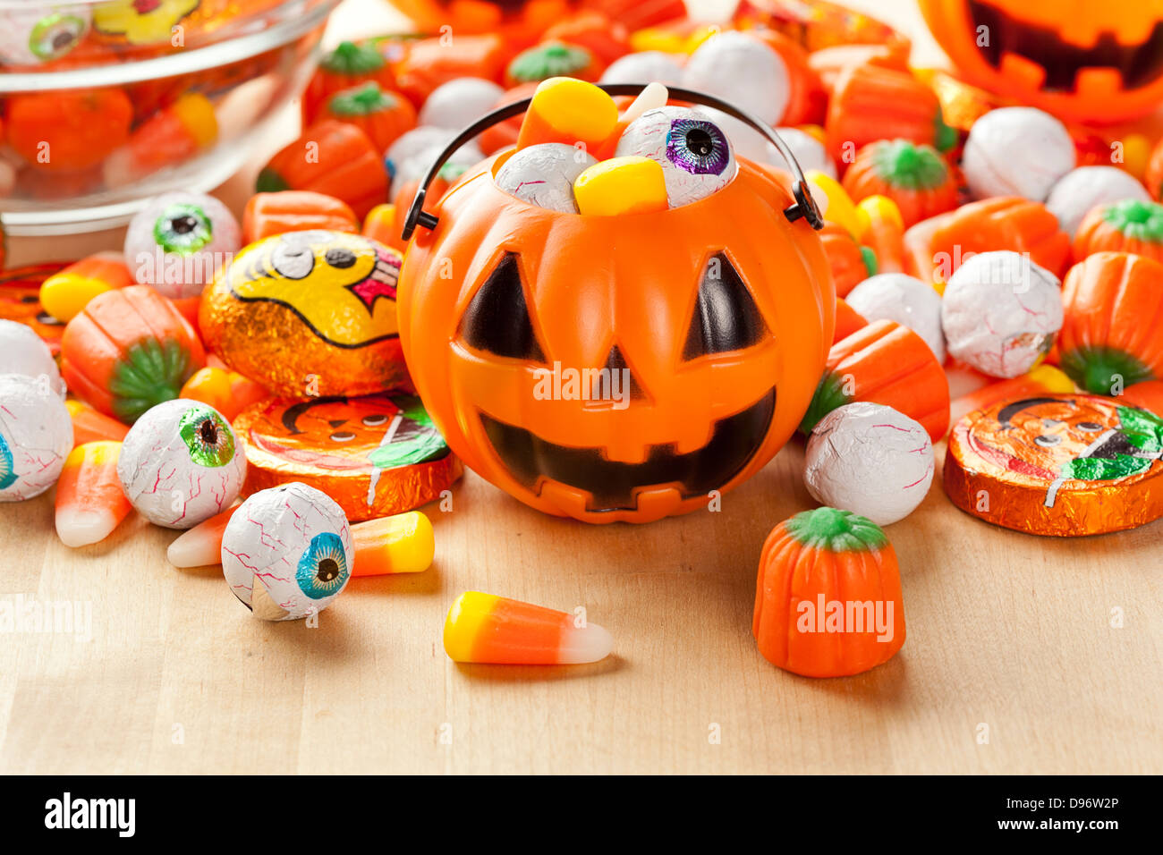 Spooky Orange Halloween Candy against a background Stock Photo - Alamy