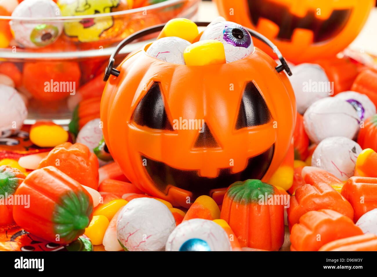 Spooky Orange Halloween Candy against a background Stock Photo - Alamy