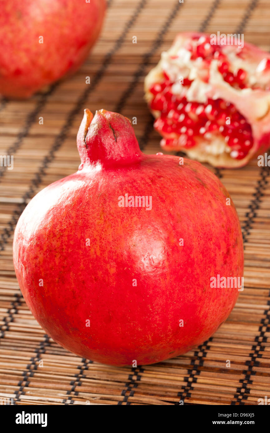 Fresh Organic Red Pomegranate on a background Stock Photo - Alamy