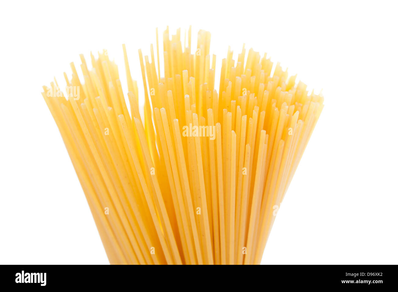 A Bundle of dry spaghetti ready to cook Stock Photo - Alamy