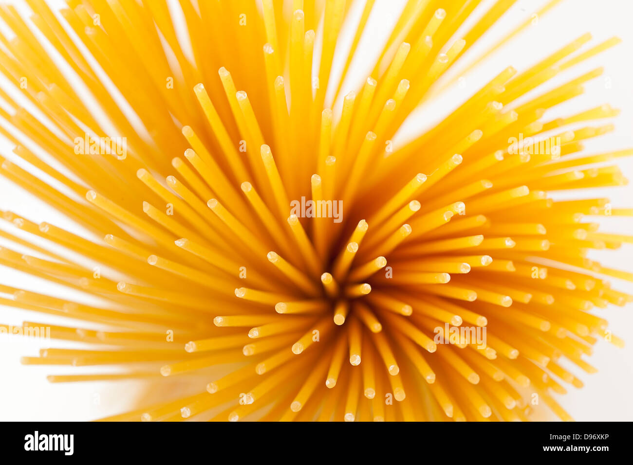 A Bundle of dry spaghetti ready to cook Stock Photo - Alamy